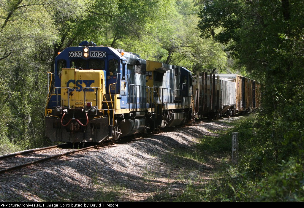 CSX 6020 leads A781-21 west past mile post AS 725